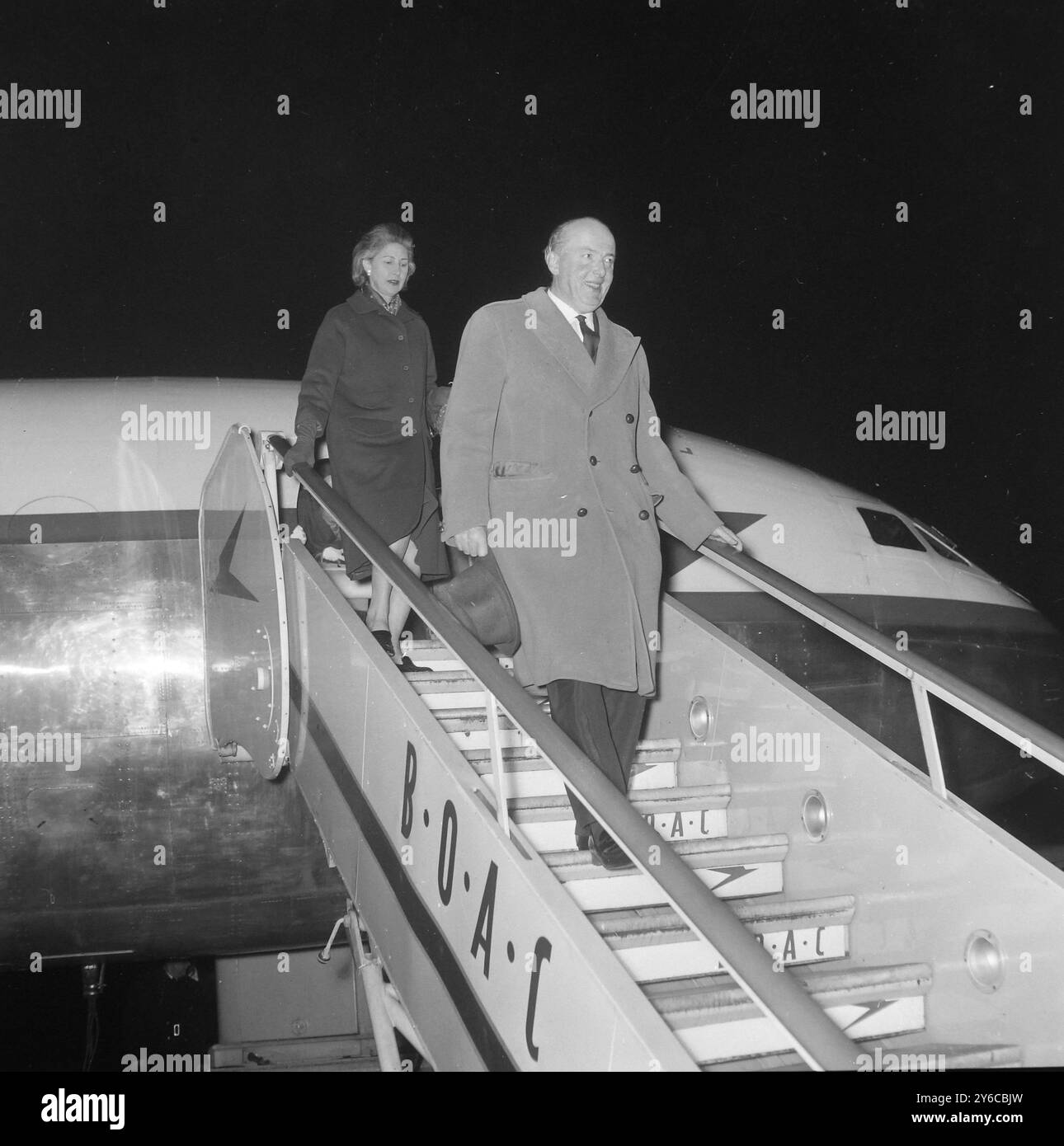 BRITISH DEFENCE MINISTER PETER THORNEYCROFT WITH WIFE AT LONDON AIRPORT ...