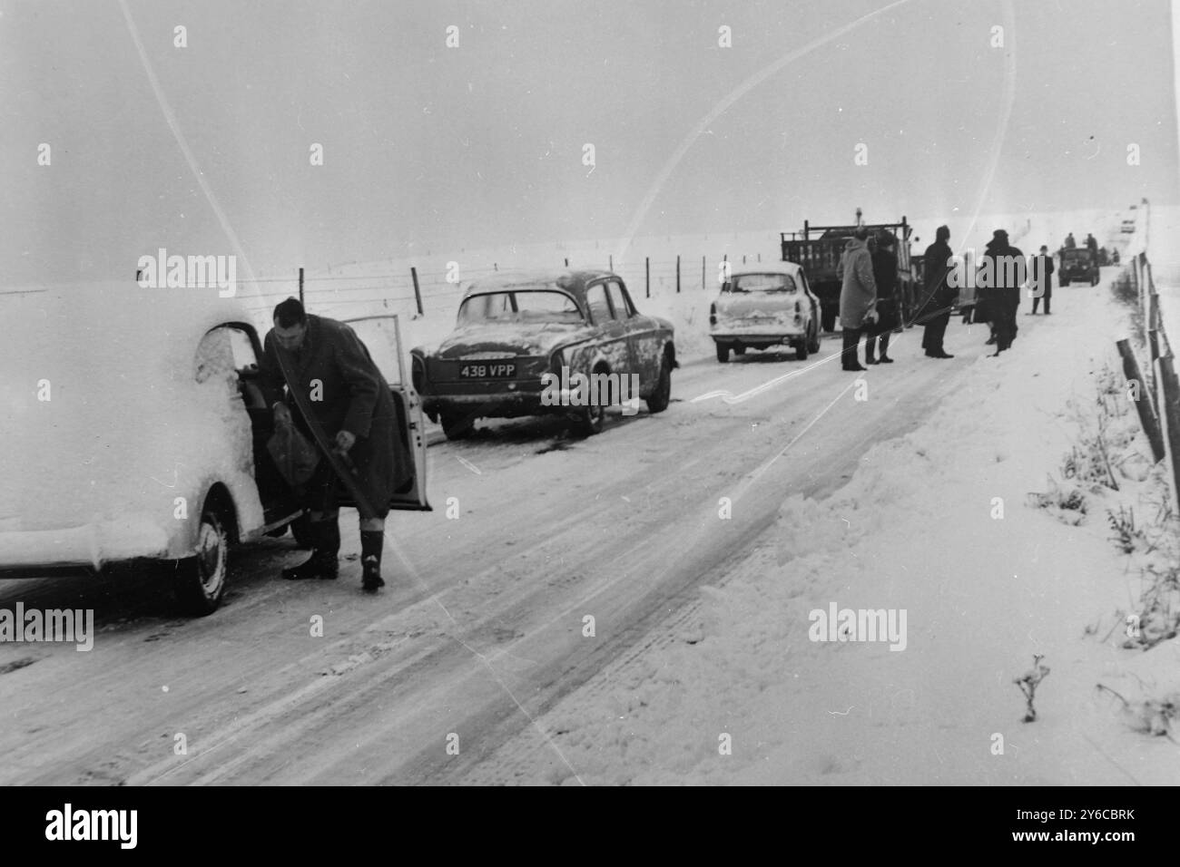 Vehicles in the snow Black and White Stock Photos & Images - Alamy