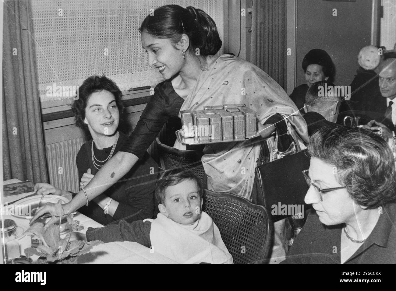 INDIAN TEA PACKETS HANDED BY SARI GIRLS AT BERNE RAIL STATION IN ...