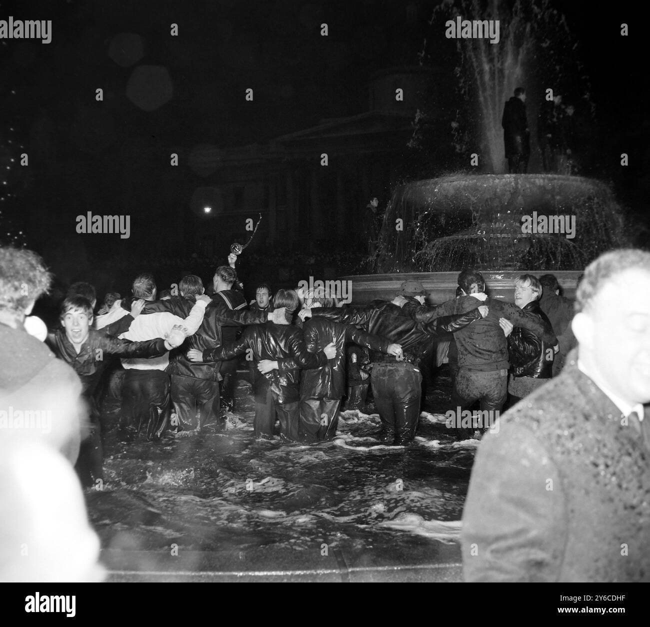 1 JANUARY 1964 - - REVELLERS WELCOME IN THE NEW YEAR IN THE FOUNTAINS ...