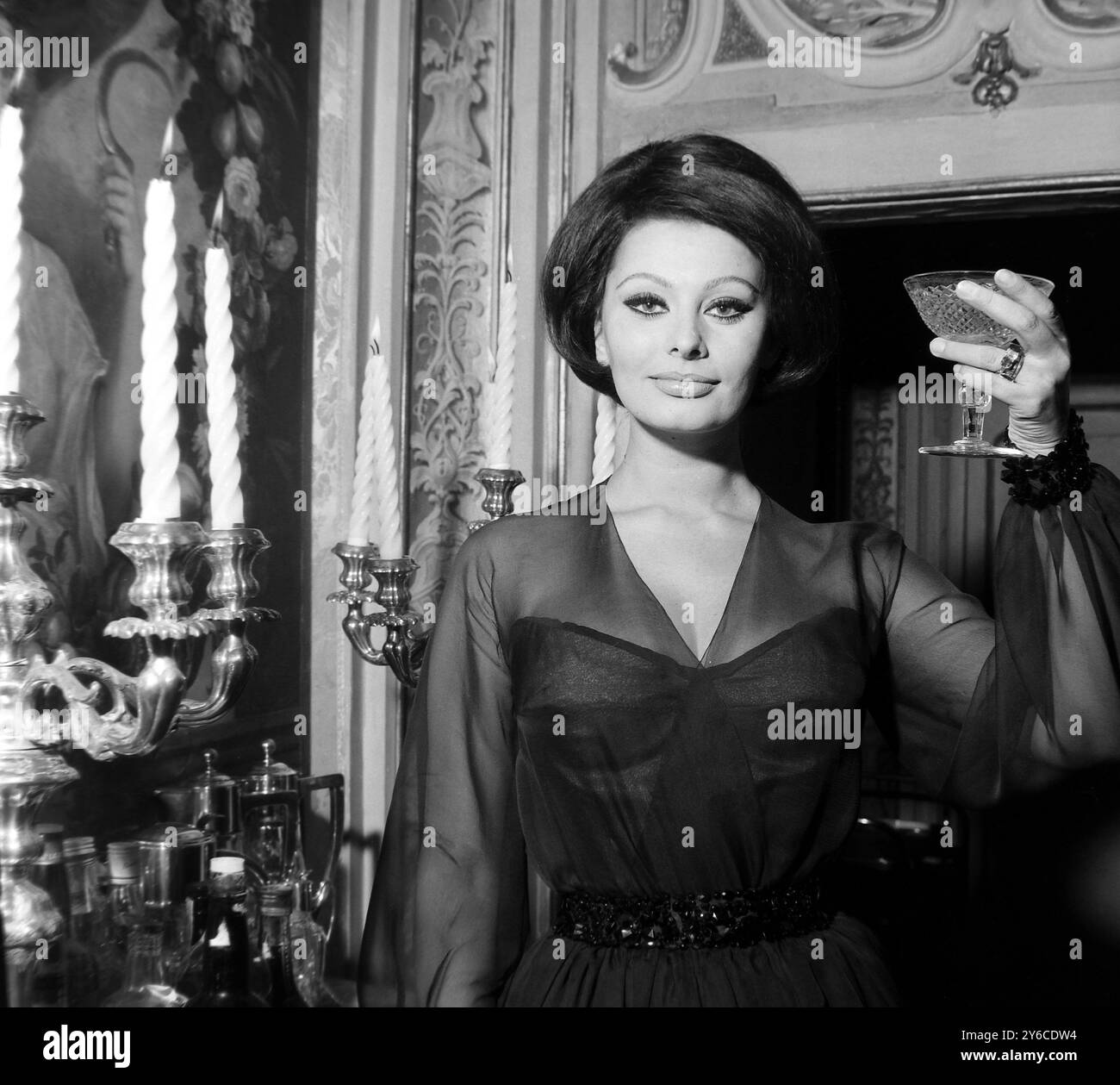 31 DECEMBER 1963 SOPHIA LOREN GIVES A NEW YEAR'S TOAST AS SHE WISHES ...