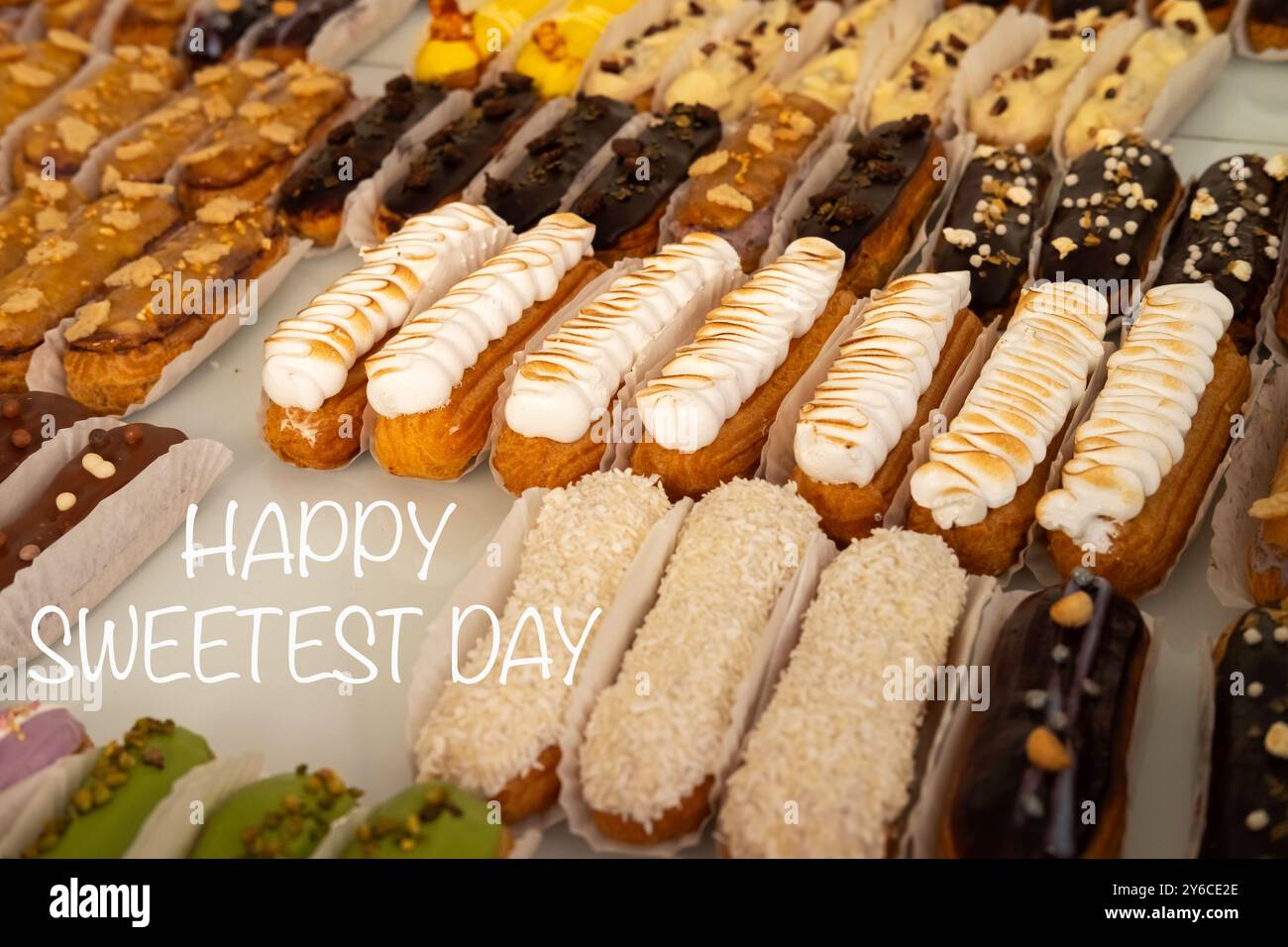 Assorted Eclairs with Happy Sweetest Day Message Stock Photo - Alamy