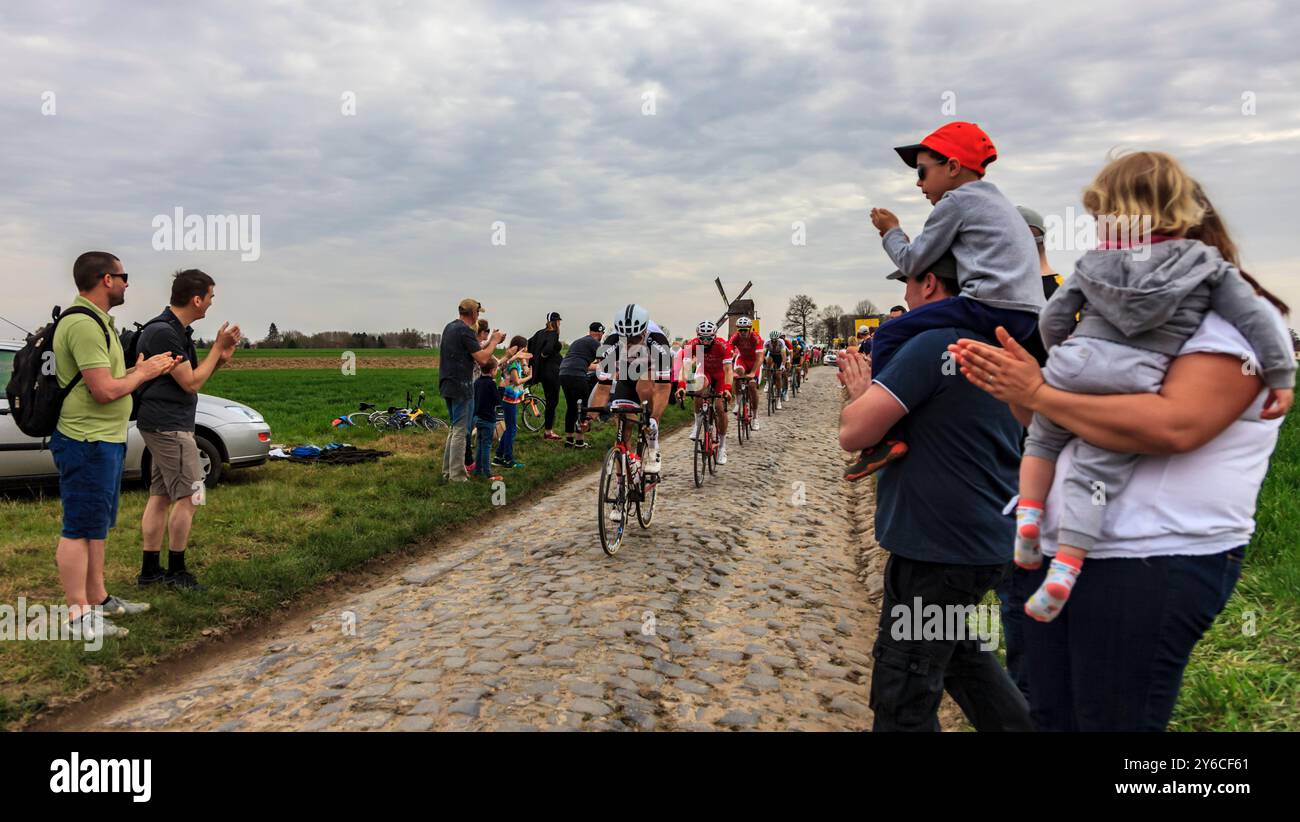 Templeuve, France - April 08, 2018: The peloton riding on the ...
