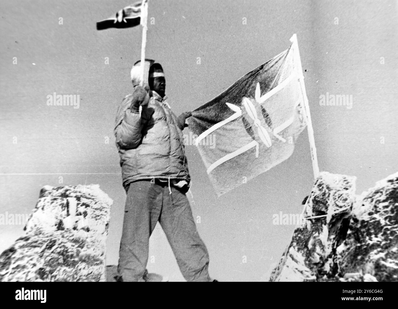 INDEPENDENCE OF KENYA - KISOI MUNYAO PLANTS NEW FLAG ON TOP OF MOUNT ...