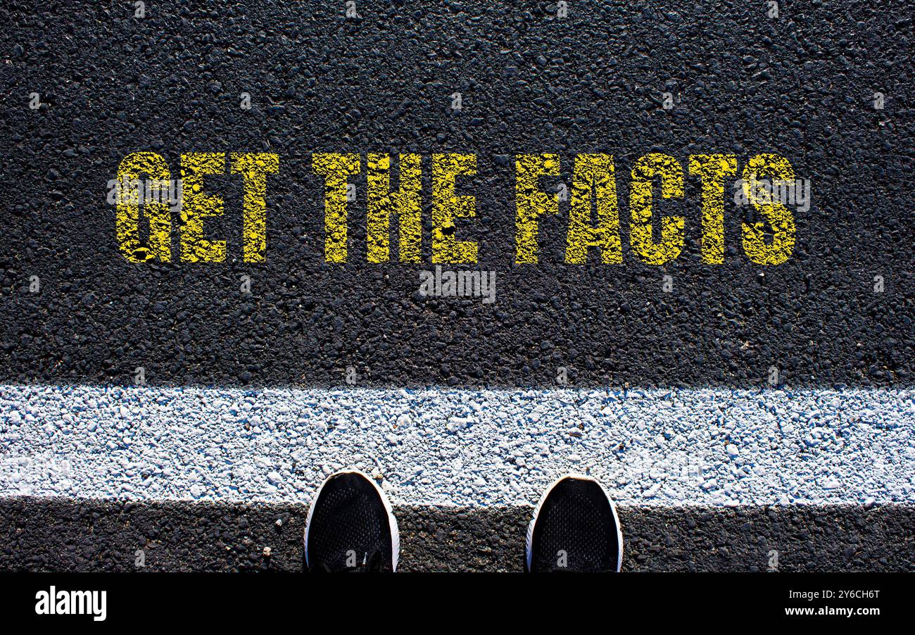 Get the facts message written on asphalt road. Conceptual get the facts ...
