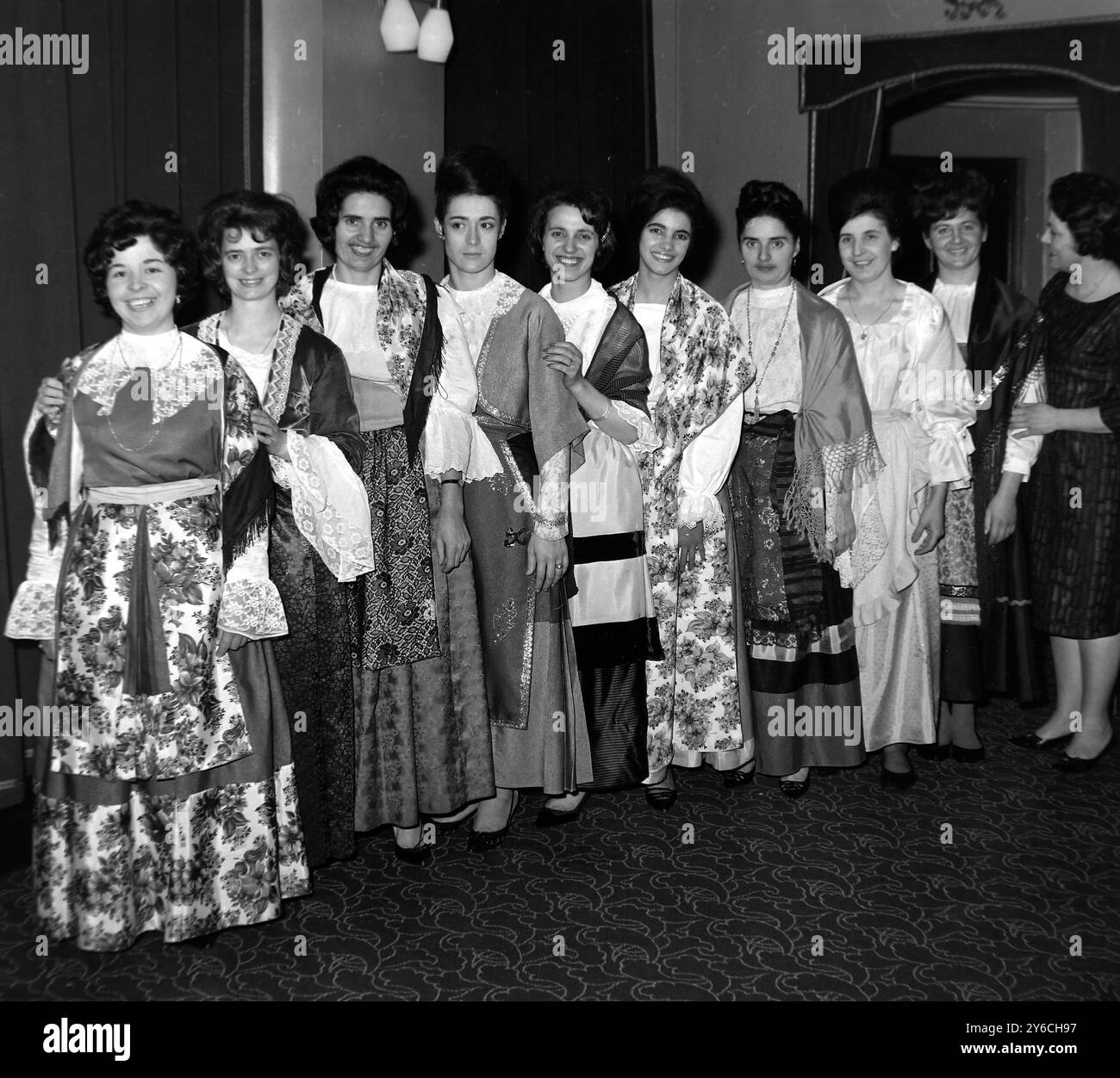 GIRLS IN NATIONAL COSTUMES AT THE LEOPARD MOVIE PREMIERE IN LONDON ; 5 ...