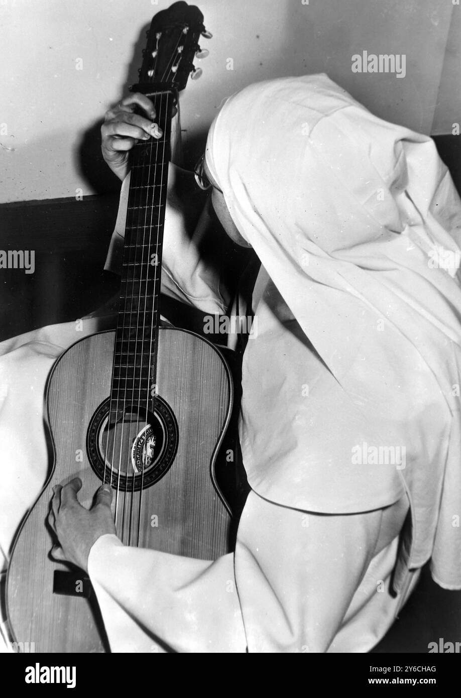 DOMINICAN SISTER NUN PLAYING A GUITAR IN FISCHERMONT, BELGIUM / ; 6 ...