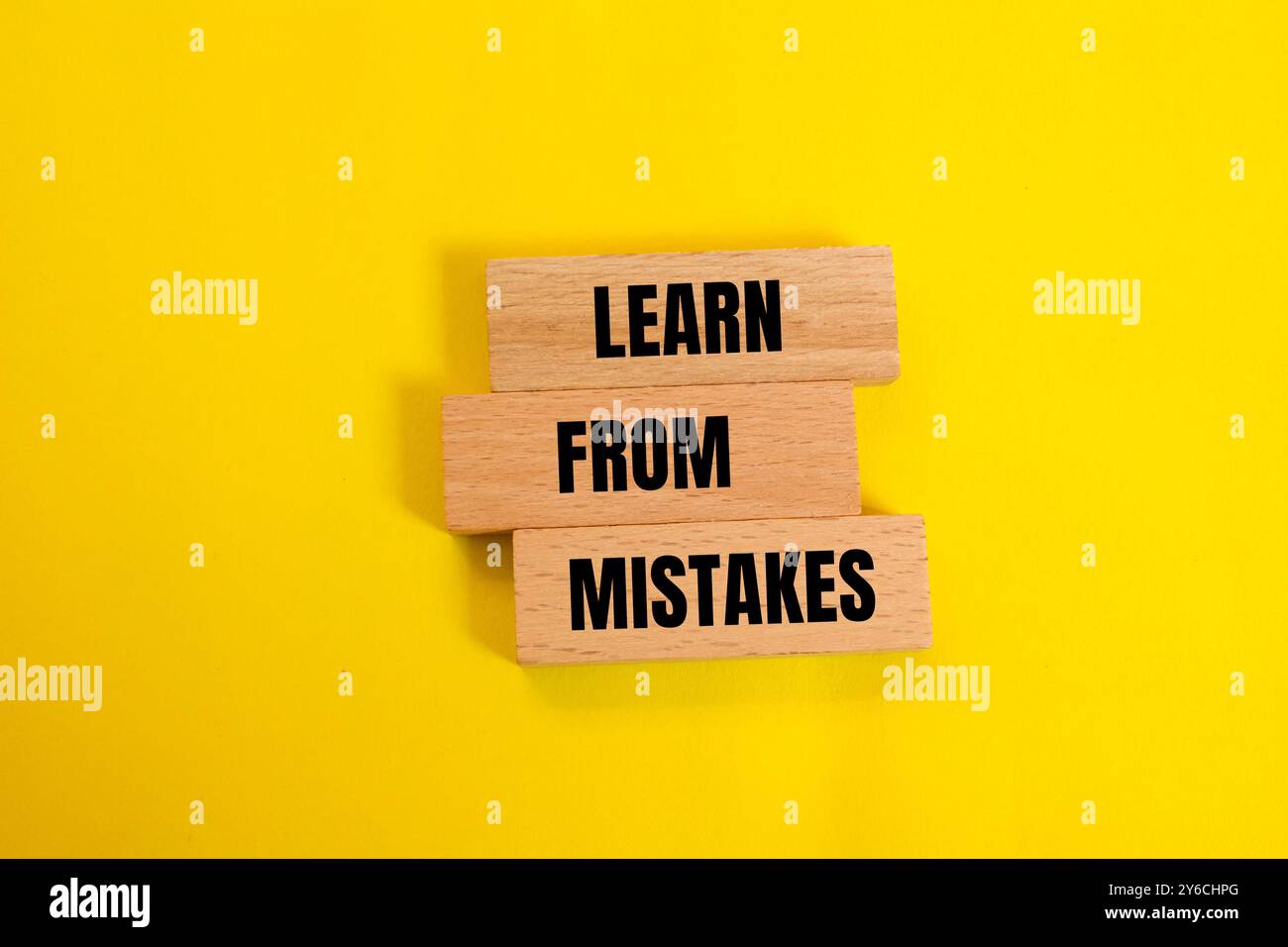 Learn from mistakes message written on wooden blocks with yellow ... Learn from mistakes message written on wooden blocks with yellow ...