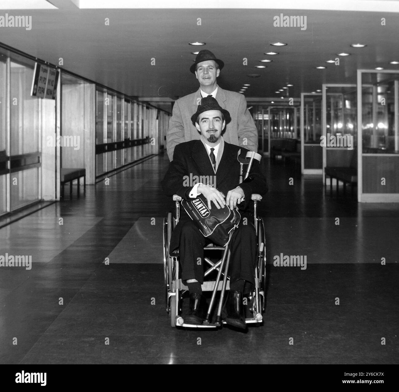 DON HARVEY WITH LLOYD FRANK IN WHEELCHAIR LEAVES THE HOSPITAL / ; 21 ...