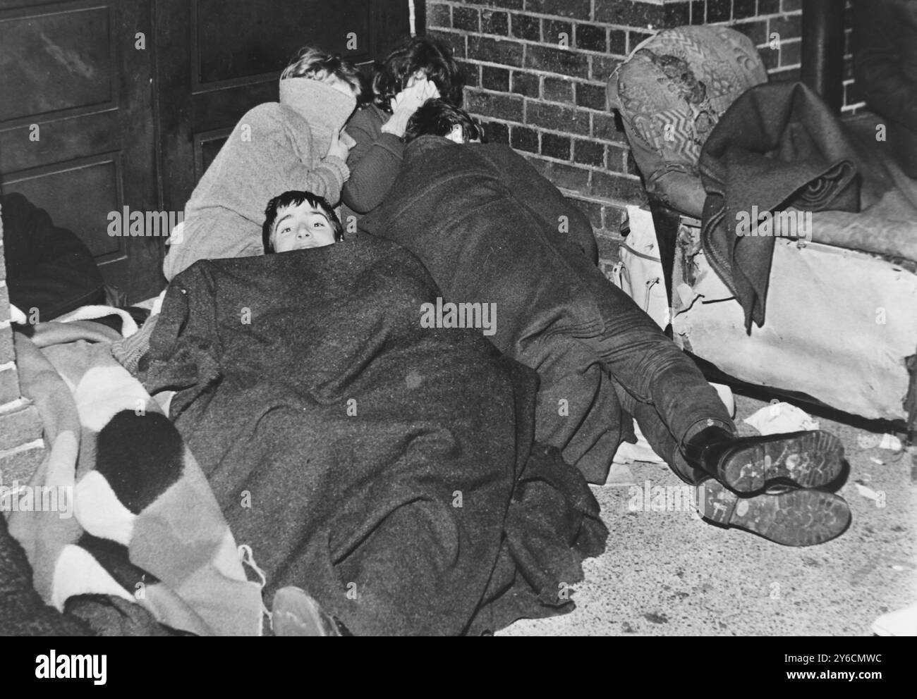 FANS OF THE BEATLES SLEEPING OUTSIDE IN QUEUE FOR TICKETS IN LONDON ...