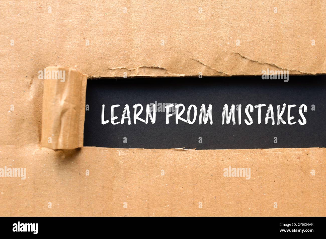 Learn from mistakes message written on ripped torn cardboard paper with ... Learn from mistakes message written on ripped torn cardboard paper with ...