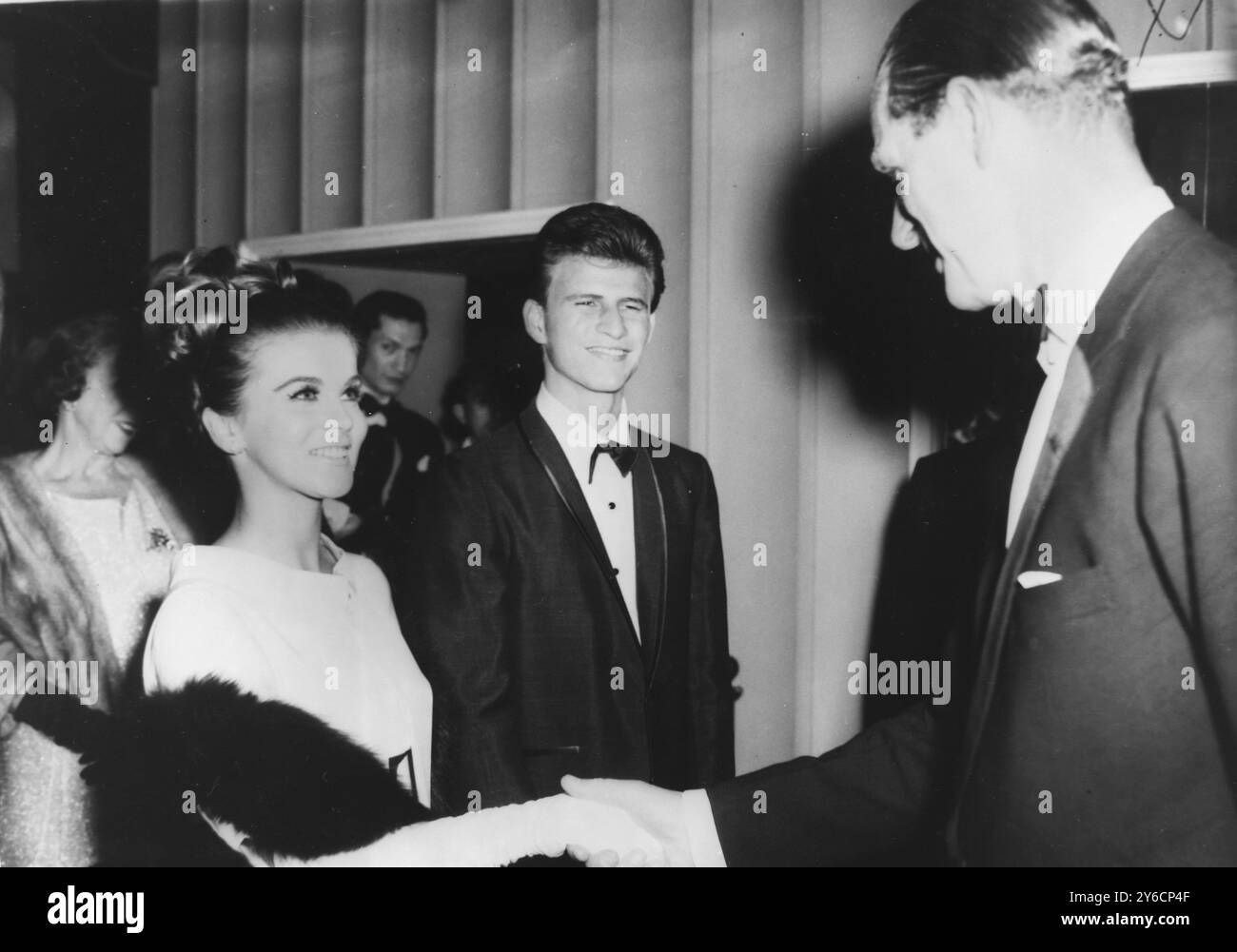 PRINCE PHILIP SHAKES HANDS WITH SWEDISH ACTRESS ANN MARGARET IN LONDON ...