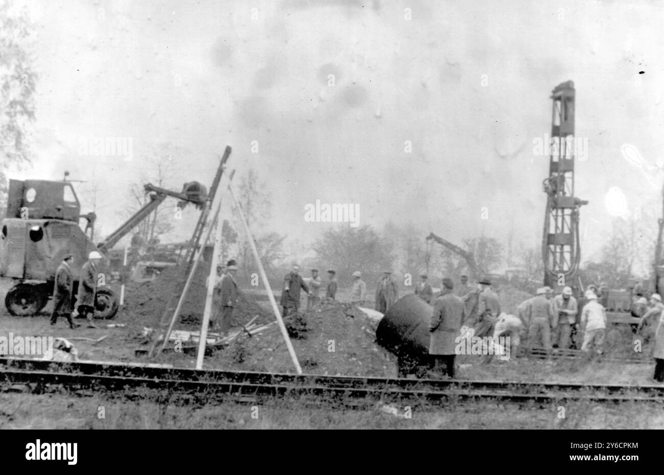 DISASTER IN GERMAN IRON ORE MINE RESCUE WORKERS AT WORK IN LENGEDE ...