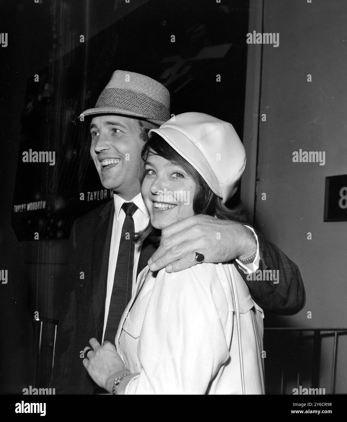IAN HENDRY WITH WIFE JANET MUNRO AT LONDON AIRPORT / ; 30 OCTOBER 1963 ...