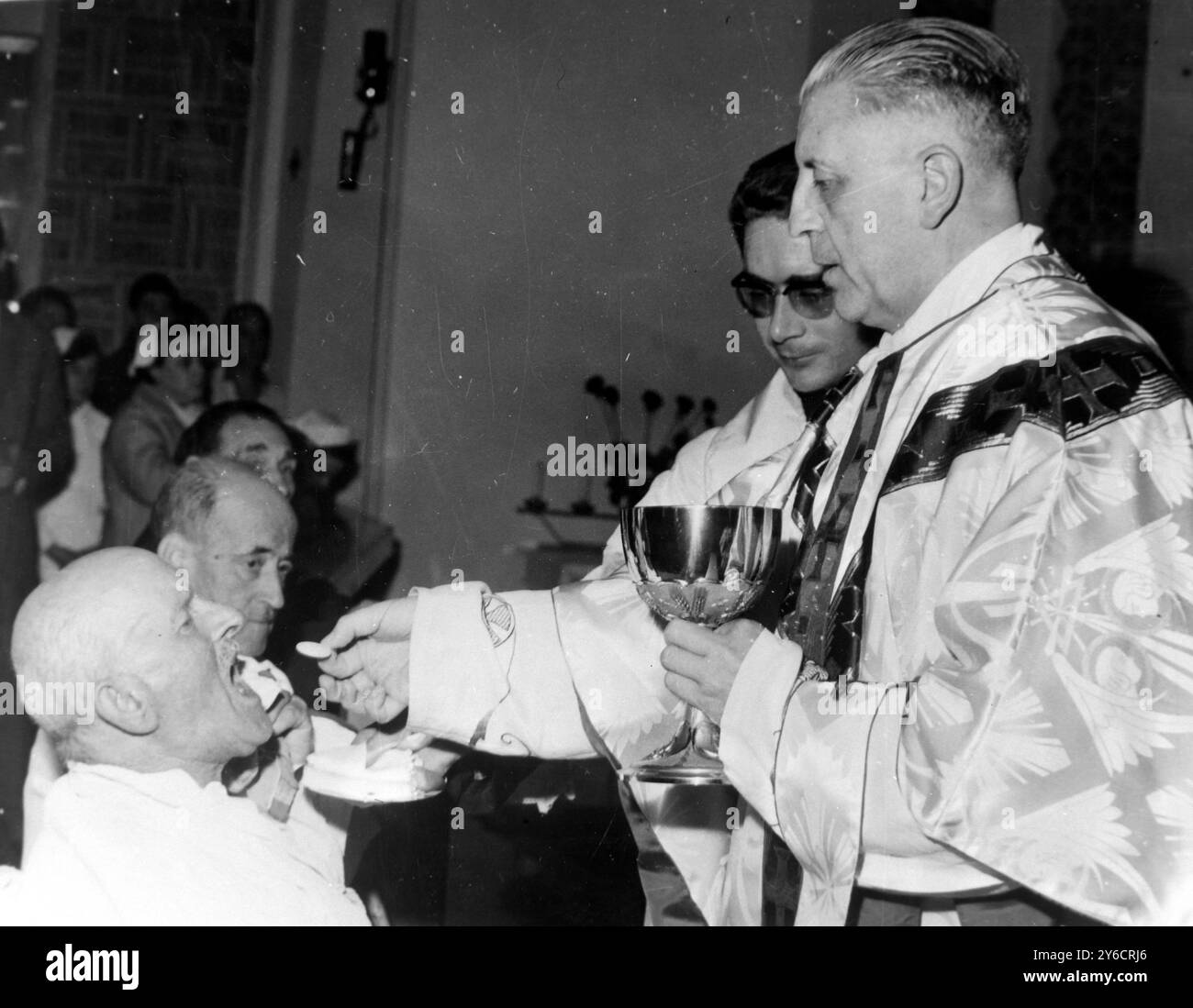 HOSPITAL PATIENTS RECEIVE COMMUNION IN ROME FROM CARDINAL JOSEF SUENENS ...
