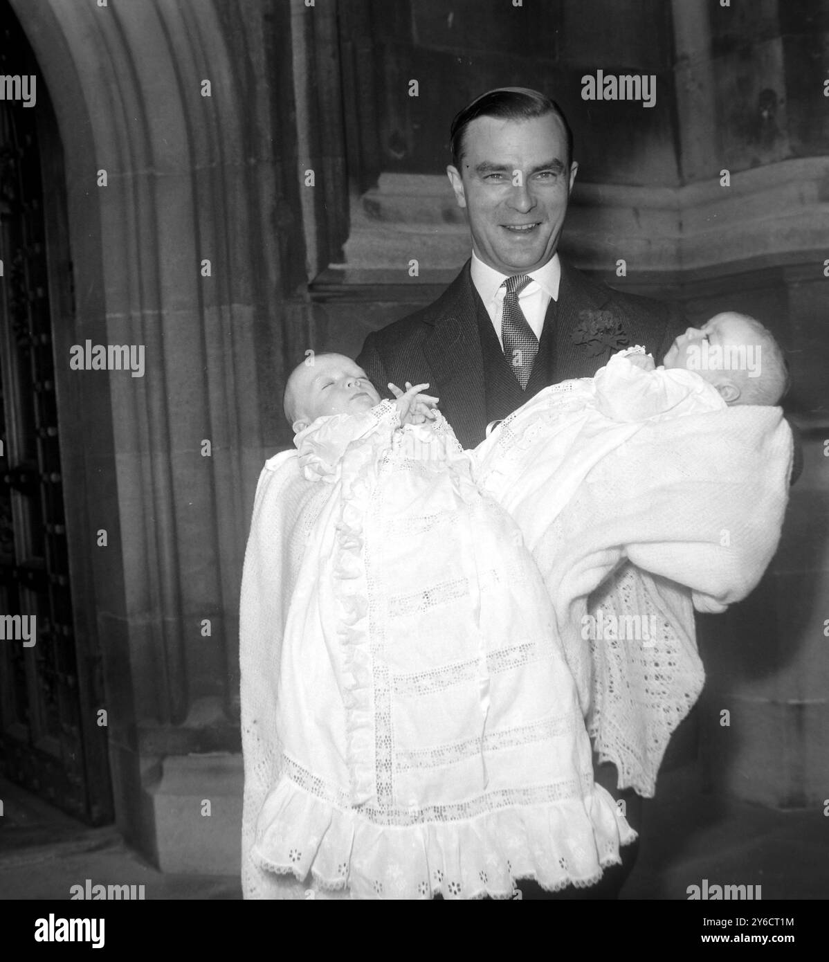 ALAN HOPKINS HOLDS TWIN SONS IN LONDON ; 23 OCTOBER 1963 Stock Photo ...