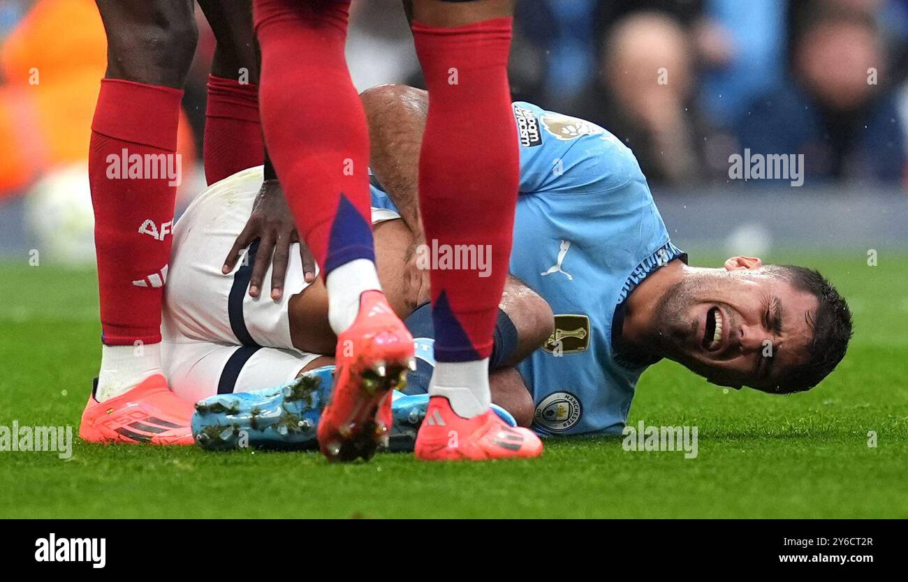 Manchester City's Rodri appears injured before being substituted during ...