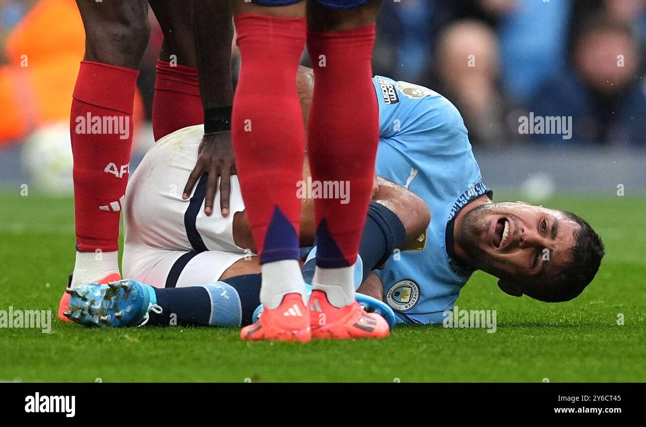 Manchester City's Rodri appears injured before being substituted during ...