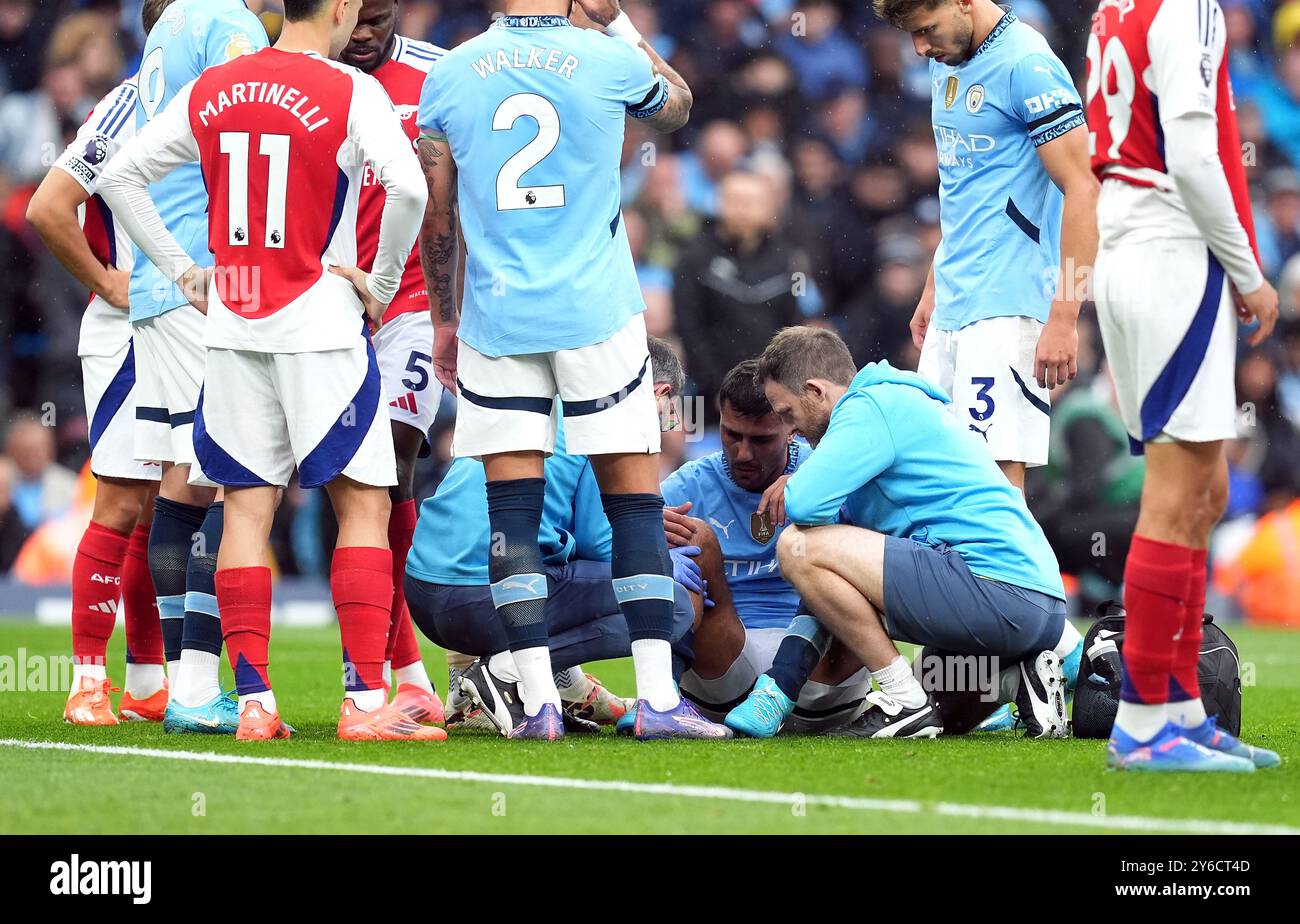 Manchester City's Rodri appears injured before being substituted during ...