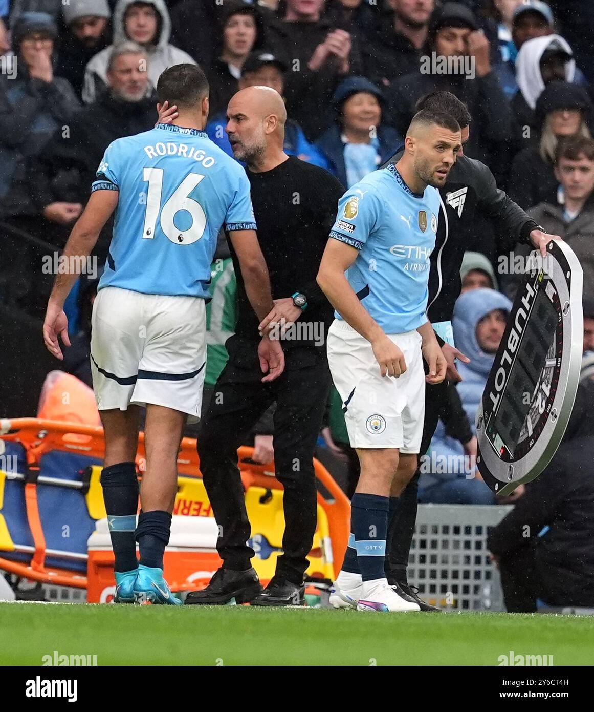 Manchester City manager Pep Guardiola with Rodri (left) during the ...
