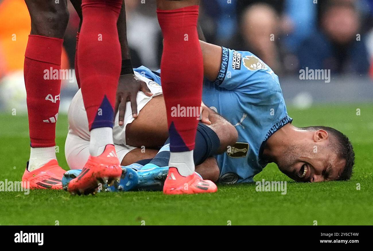 Manchester City's Rodri appears injured before being substituted during ...