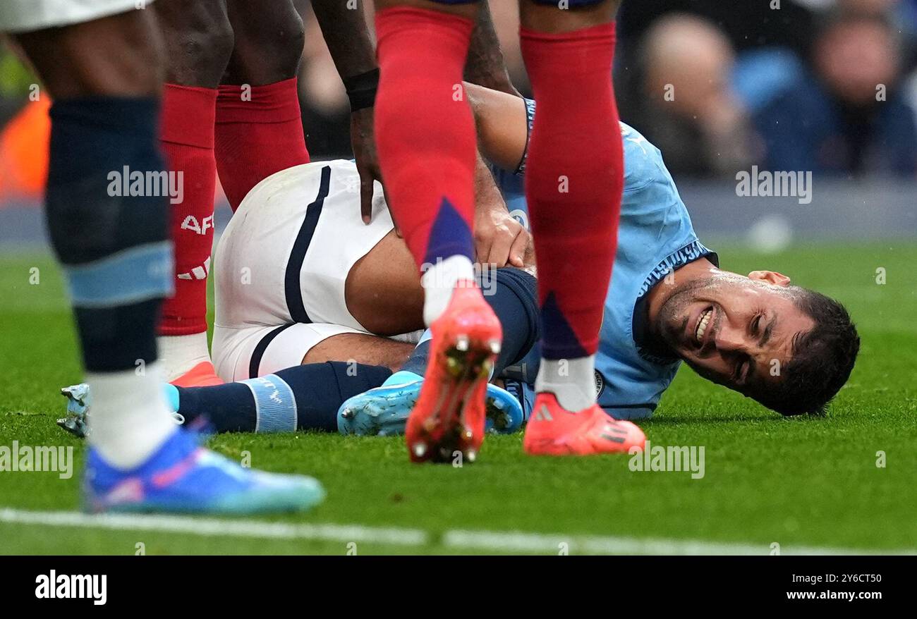 Manchester City's Rodri appears injured before being substituted during ...