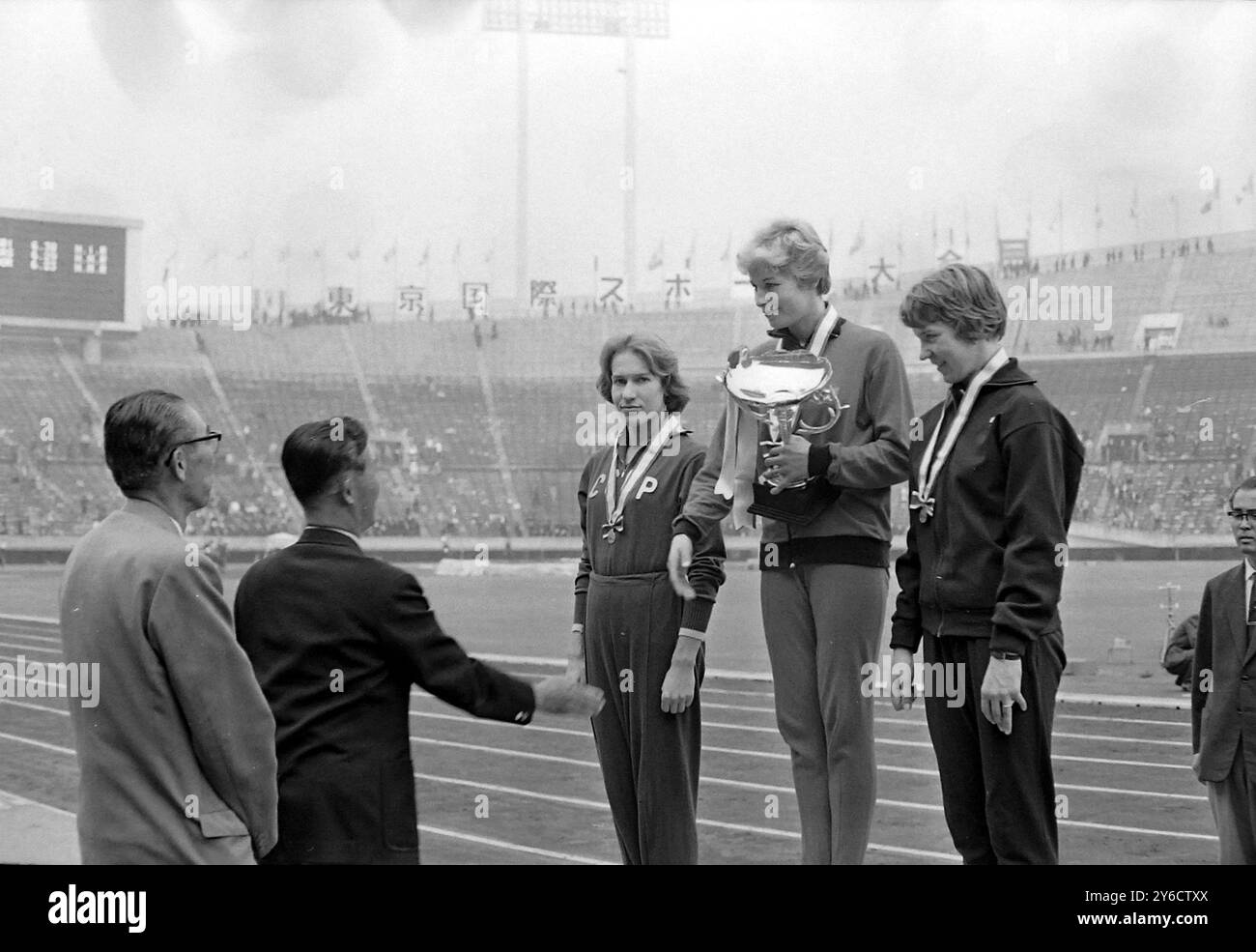 ATHLETICS MARY RAND RECEIVES TROPHY IN TOKYO, JAPAN AFTER WINNING IN ...