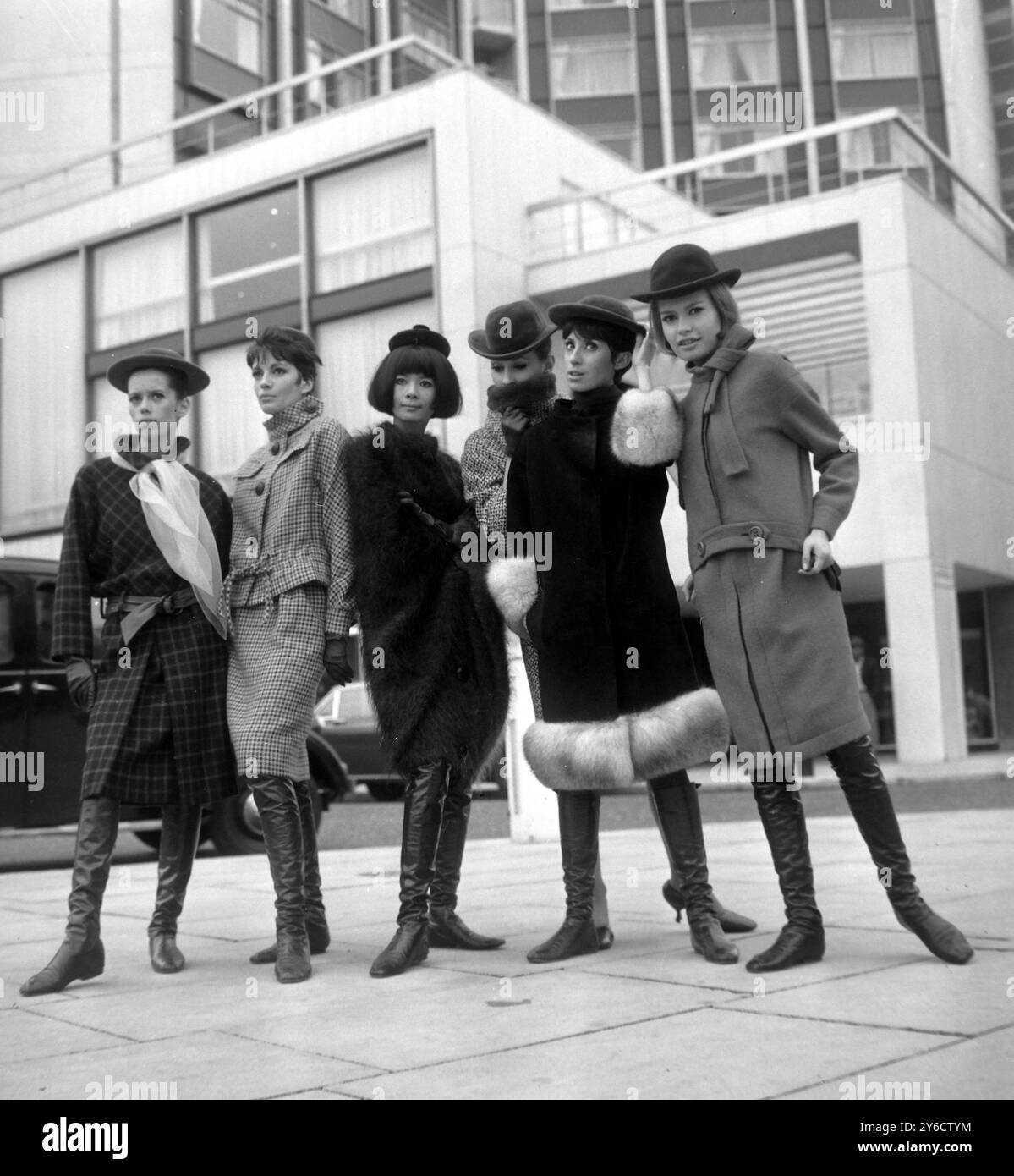 Pierre Cardin models wearing winter coats and boots at his collection ...