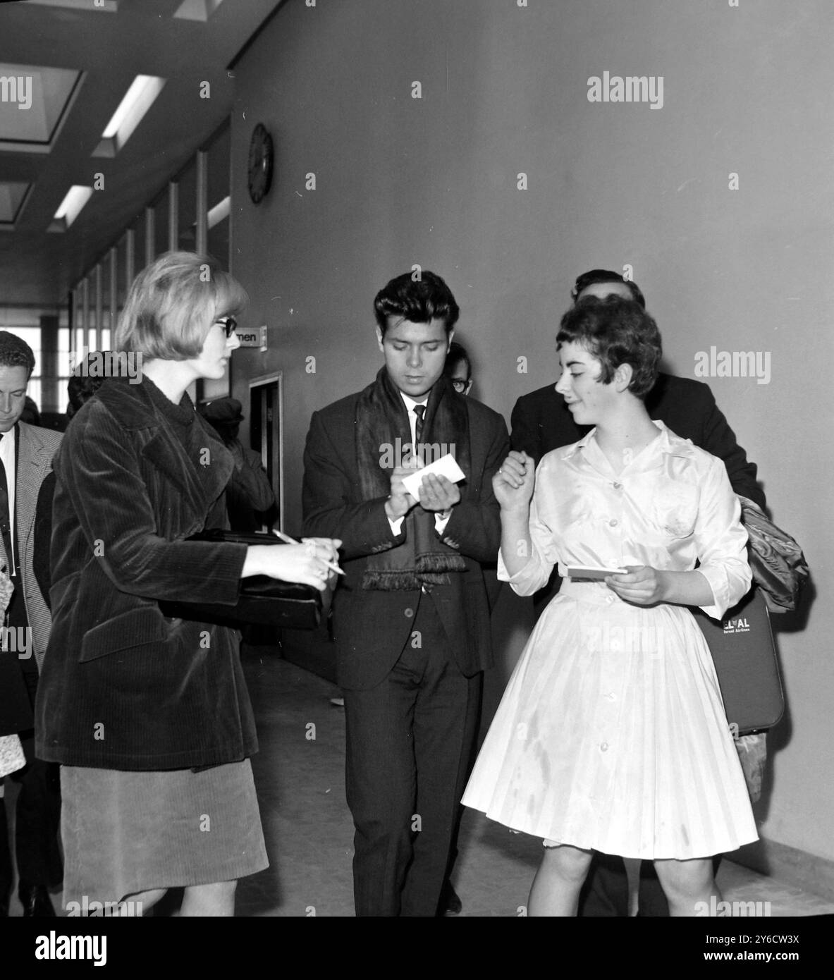 CLIFF RICHARD SIGNS AUTOGRAPHS FOR FANS AT LONDON AIRPORT / ; 15 ...