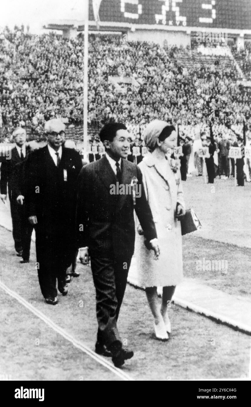 ATHLETICS PRINCE AKIHITO AND WIFE INSPECT ATHLETES AT OPENING IN TOKYO ...