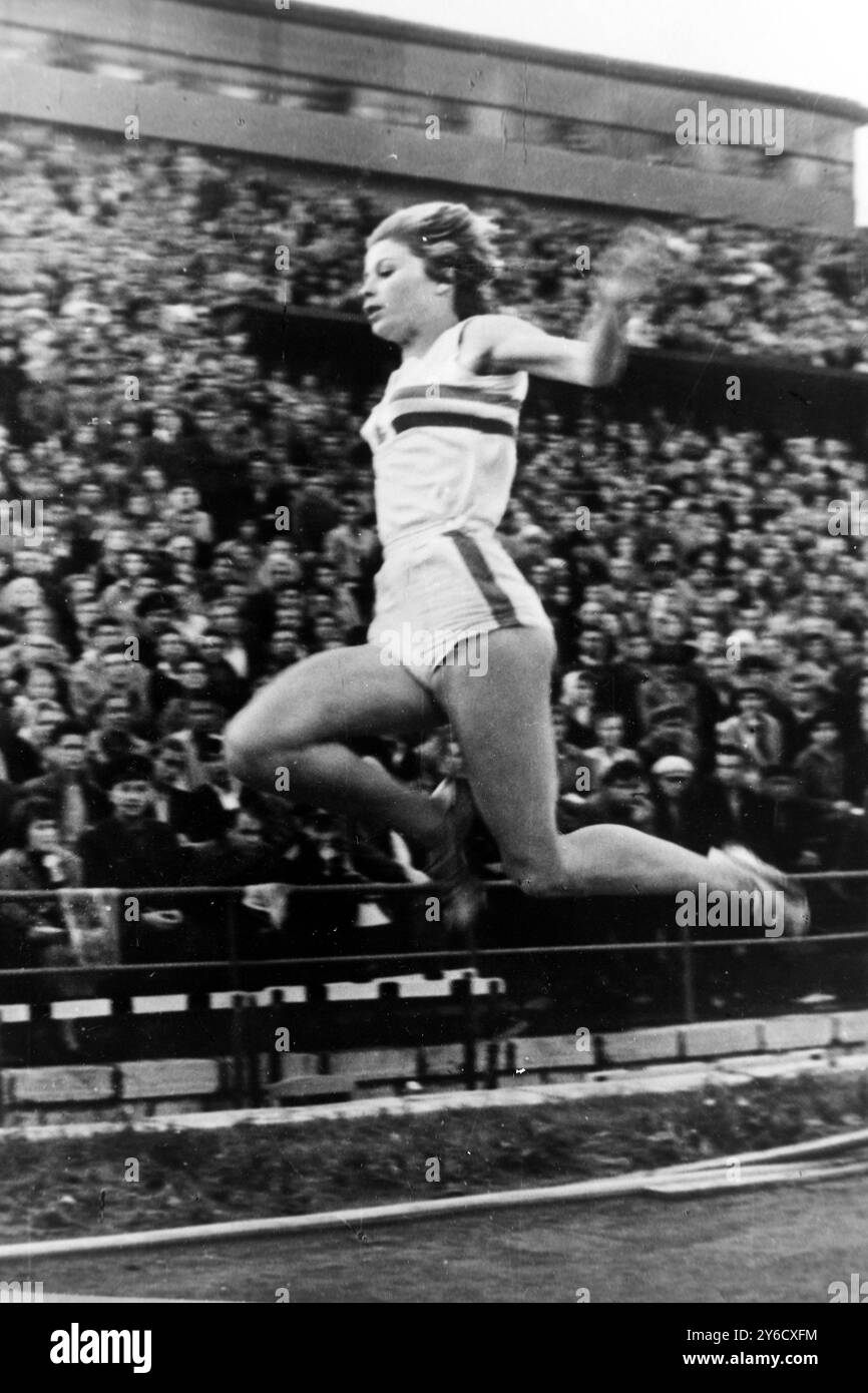 ATHLETICS MARY RAND IN LONG JUMP ACTION ; 10 OCTOBER 1963 Stock Photo ...