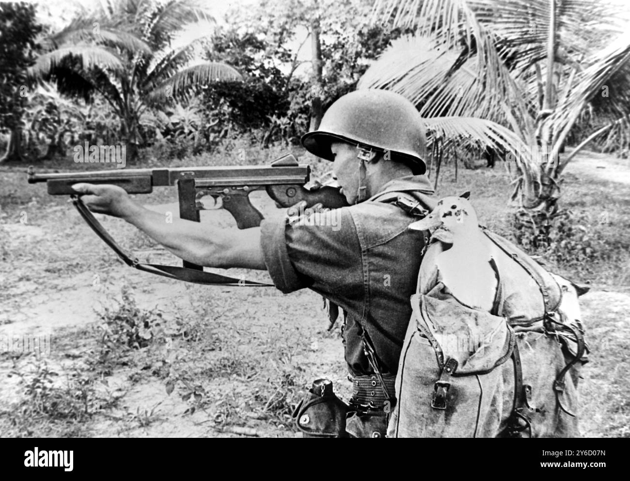 28 SEPTEMBER 1963 A SOLDIER OF SOUTH VIETNAM SHOOTS AT THE VIET CONG ...