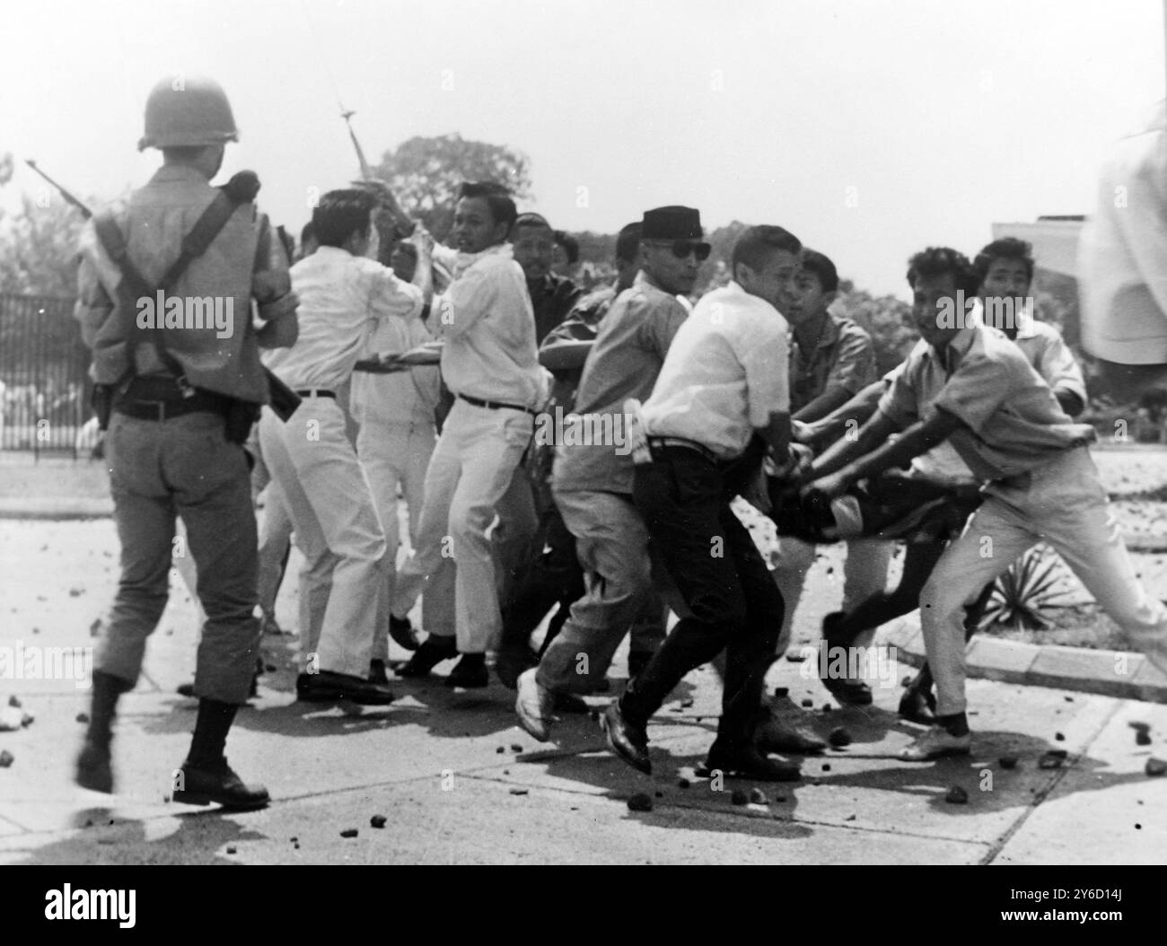 RIOTS SOLDIERS WATCH INDONESIANS TEAR UNION JACK IN DJAKARTA ; 18 ...