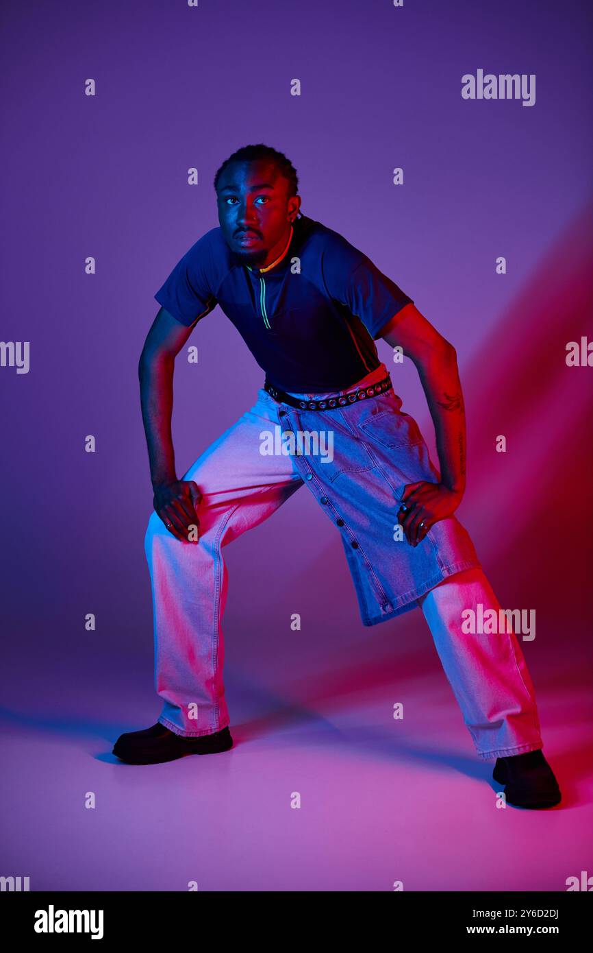 A young African American man showcases his unique style with a fierce ...