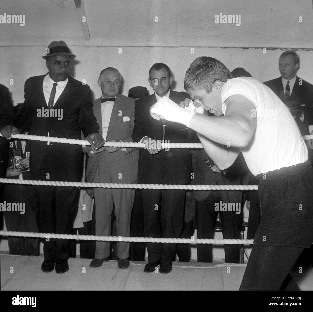 BOXER SONNY LISTON TRAINS WITH BILLY WALKER IN PITSEA, ESSEX / ; 4 ...