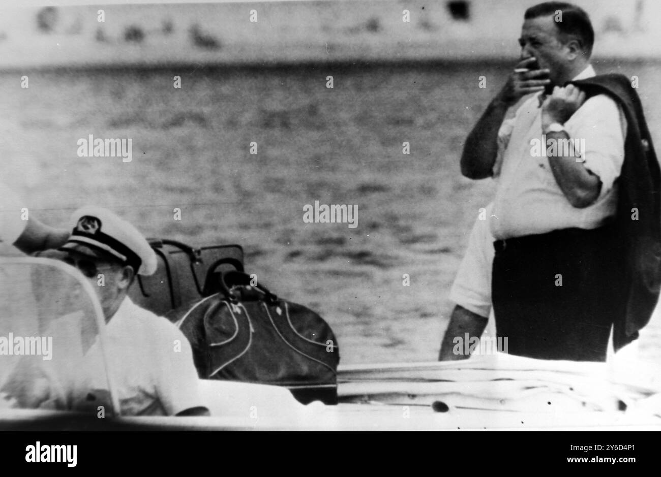 FORD HENRY II SMOKES CIGARETTE ON MOTOR LAUNCH IN NICE, FRANCE / ; 15 ...