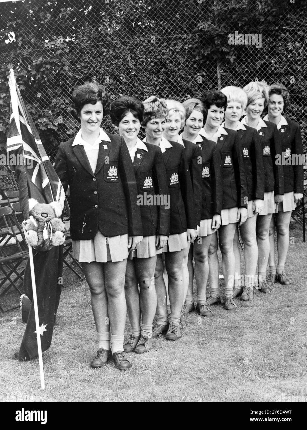 Lining up to offer winning smiles to the cameras here today, are the ...