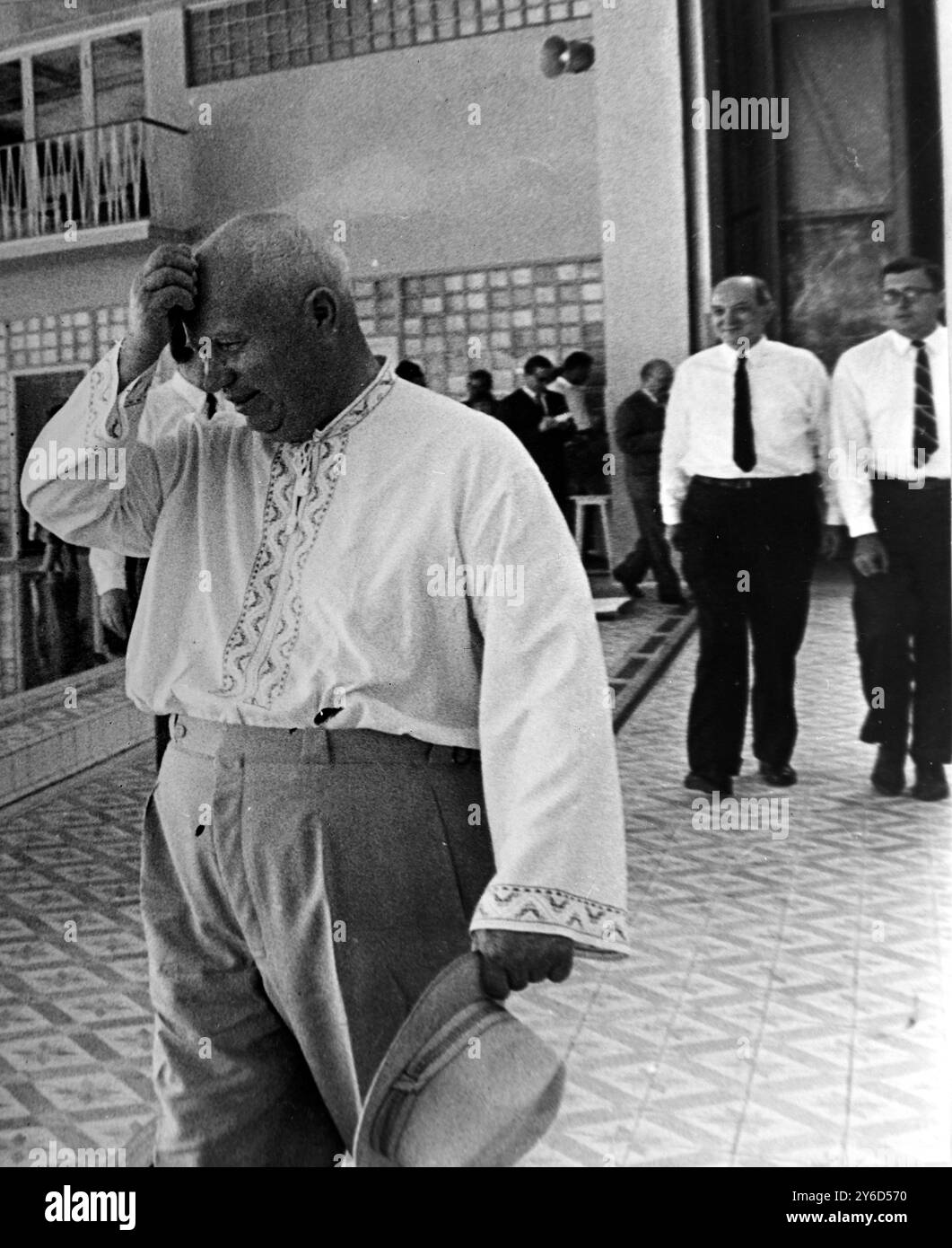 SOVIET PRIME MINISTER NIKITA KHRUSHCHEV AND DEAN RUSK PLAYING BADMINTON ...