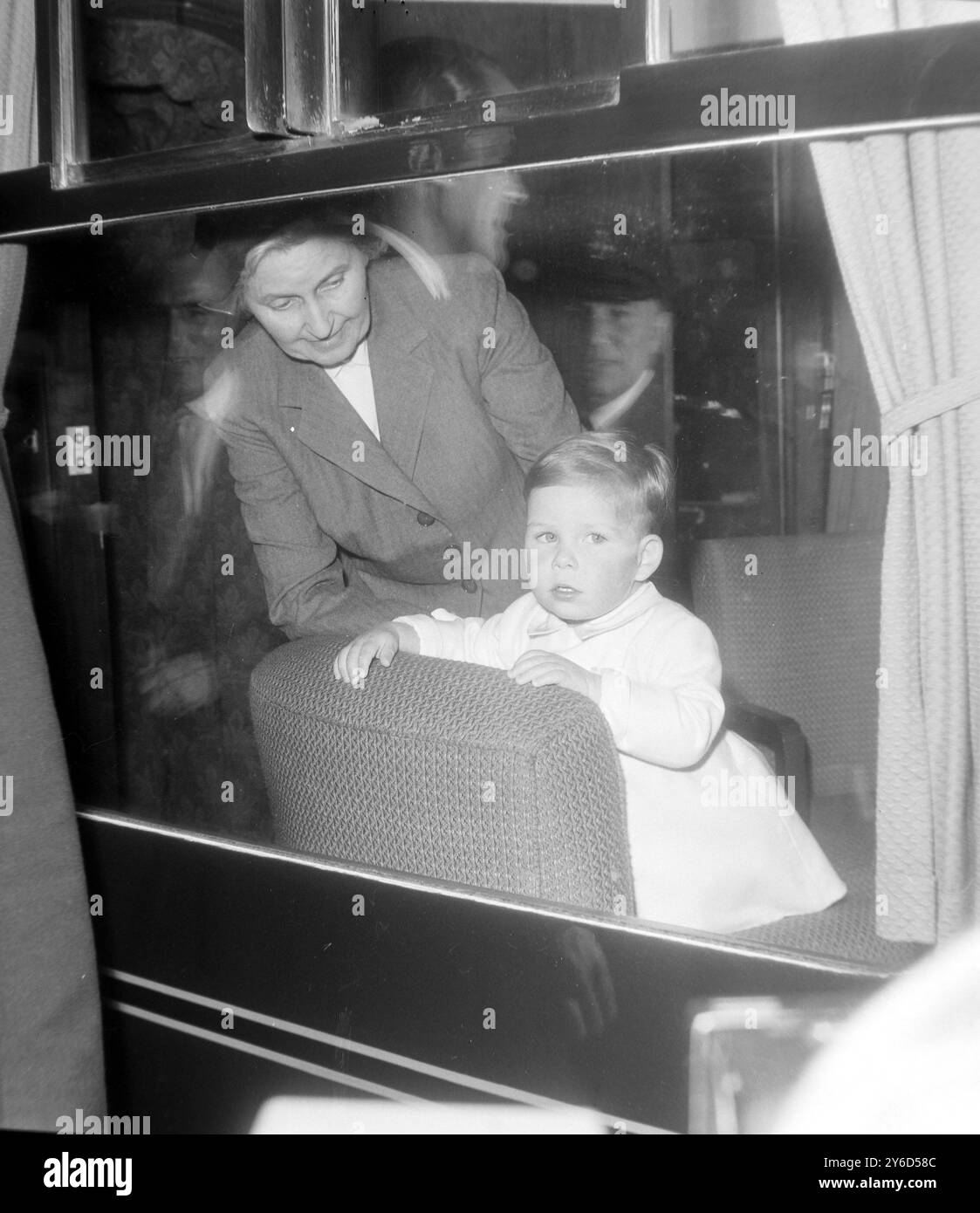 VISCOUNT LINLEY ON A TRAIN AT EUSTON STATION WITH NANNY IN LONDON ; 8 ...