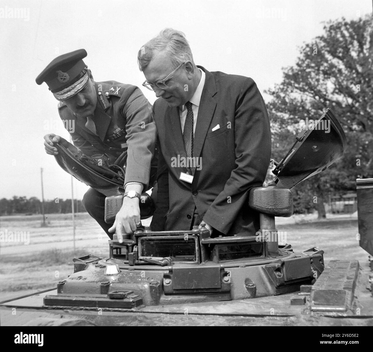 MAJOR GENERAL HUTTON WITH MINISTER JOSPEH GODBER LOOK AT BRITISH ARMY ...