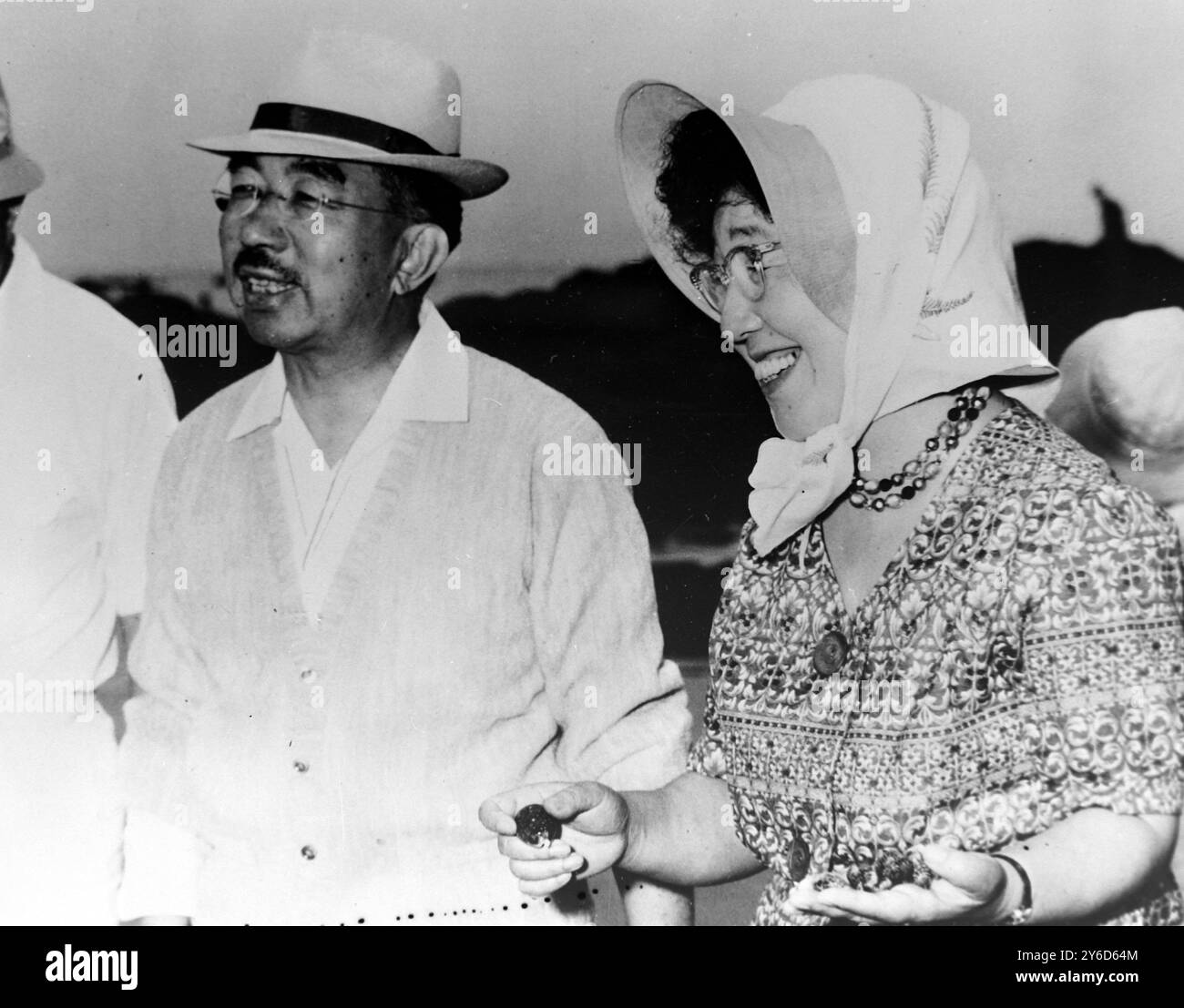 EMPEROR HIROHITO WITH WIFE SHOWING SEASHELLS IN HAYANA, JAPAN ; 31 JULY ...