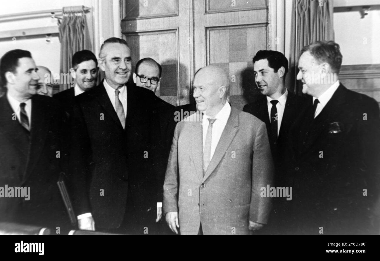 Soviet Prime Minister Nikita Khrushchev is flanked by Britain's ...