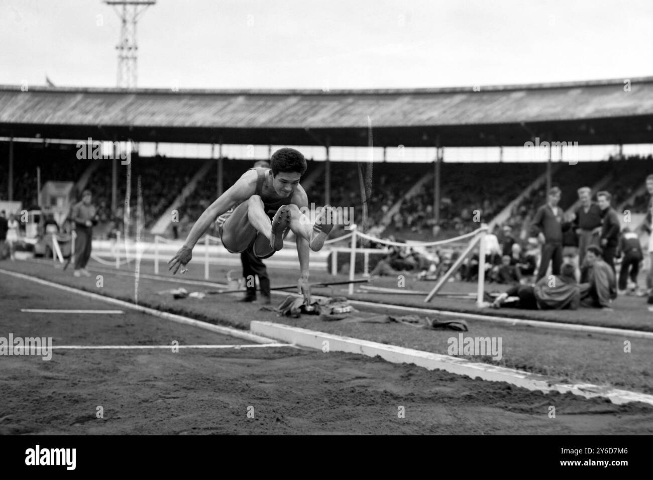 LONG JUMP ATHLETE TAKAYUKI OKAZAKI IN ACTION AT AAA CHAMPIONSHIPS IN ...