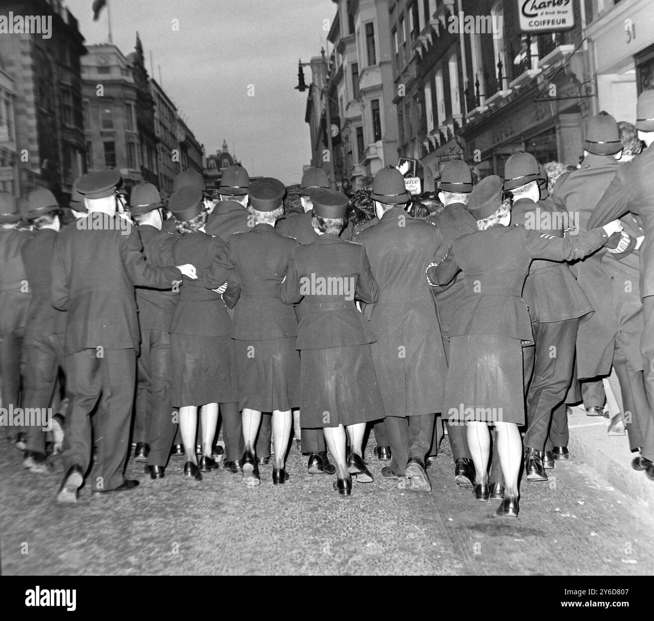 12 JULY 1963 POLICE HOLD BACK A CROWD OF ANTI-GREEK PROTESTORS WHO ...