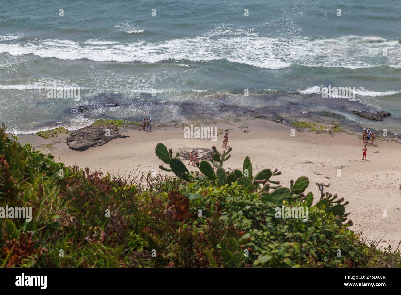 Praia da Cal (Cal Beach) shore with its rocks in Torres, Rio Grande do ...