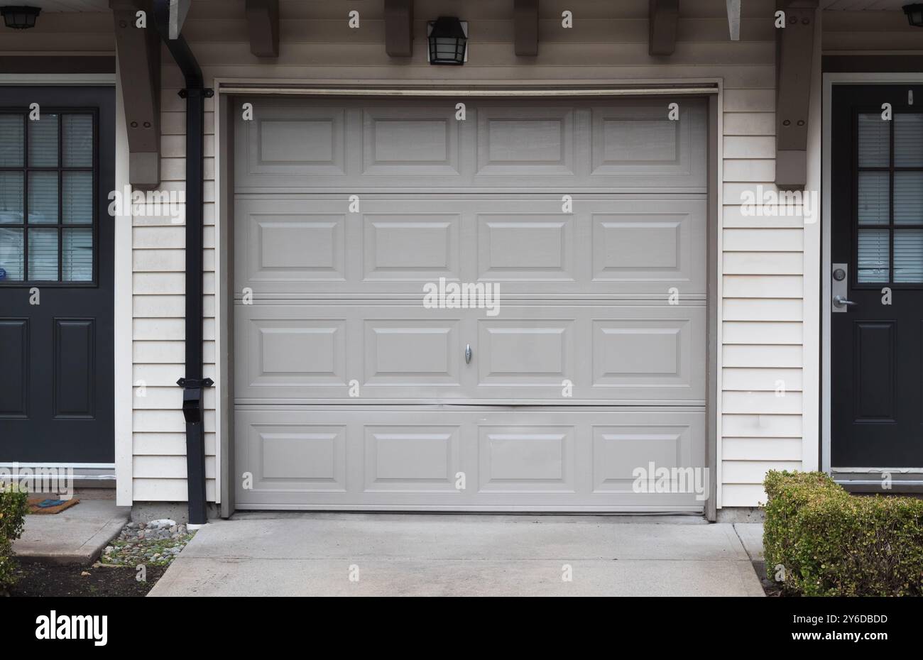 Garage Door. Modern house with garage door that is closed. A perfect ...