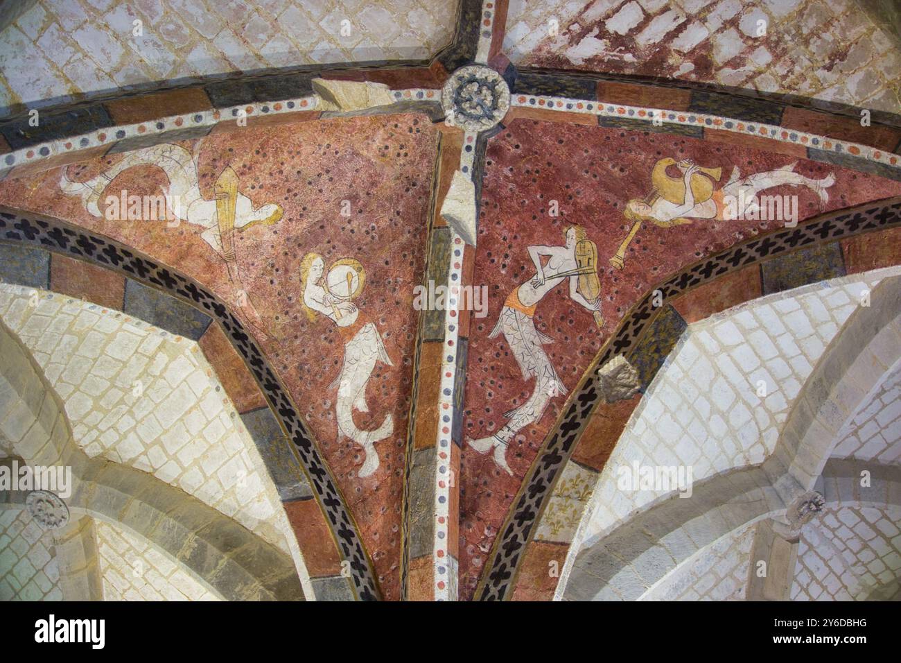 Medieval painted mermaid figures in the crypt of Beauvais cathedral ...