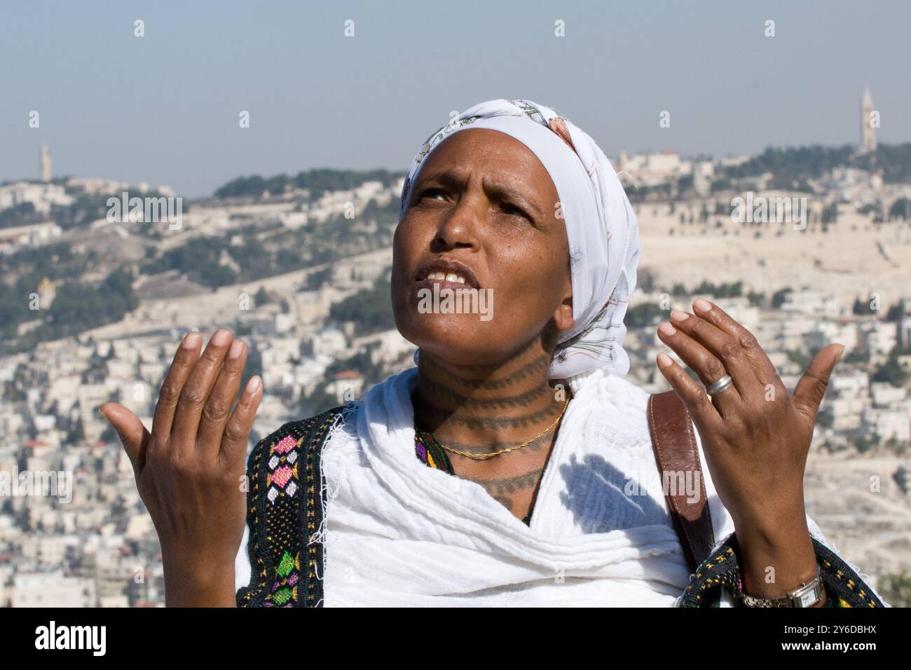 An Ethiopian woman, a member of the Beta Israel Jewish community, prays ...