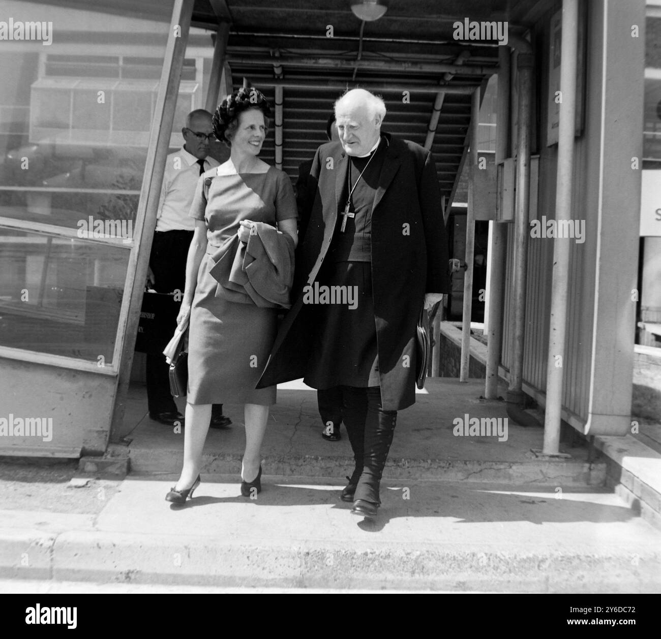 ARCHBISHOP OF CANTERBURY MICHAEL RAMSEY WITH WIFE AT LONDON AIRPORT ...