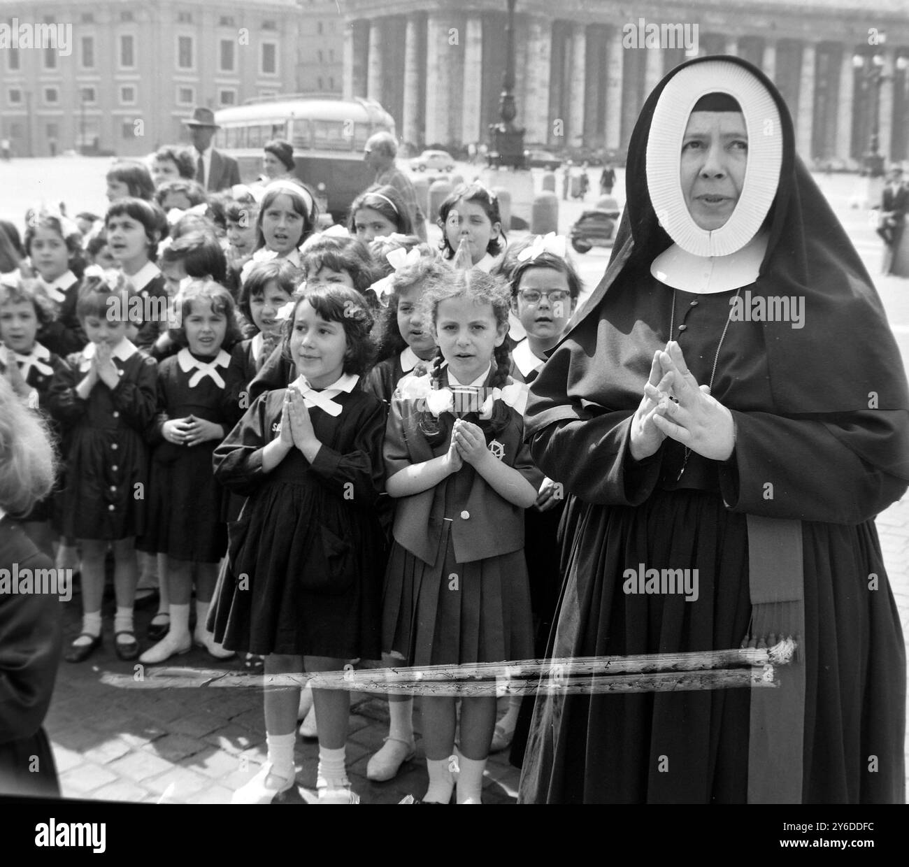 NUN WITH CHILDREN PRAYING FOR POPE JOHN XXIII IN VATICAN CITY, ROME ...